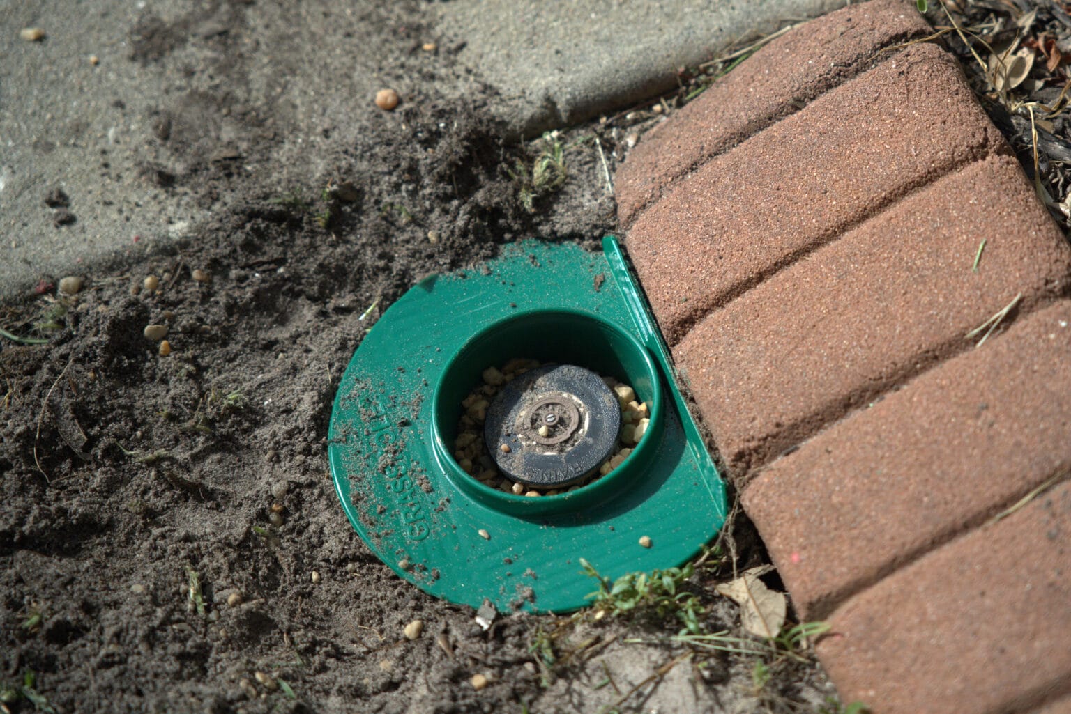 Installing Sprinkler-Guard to protect your sprinkler heads